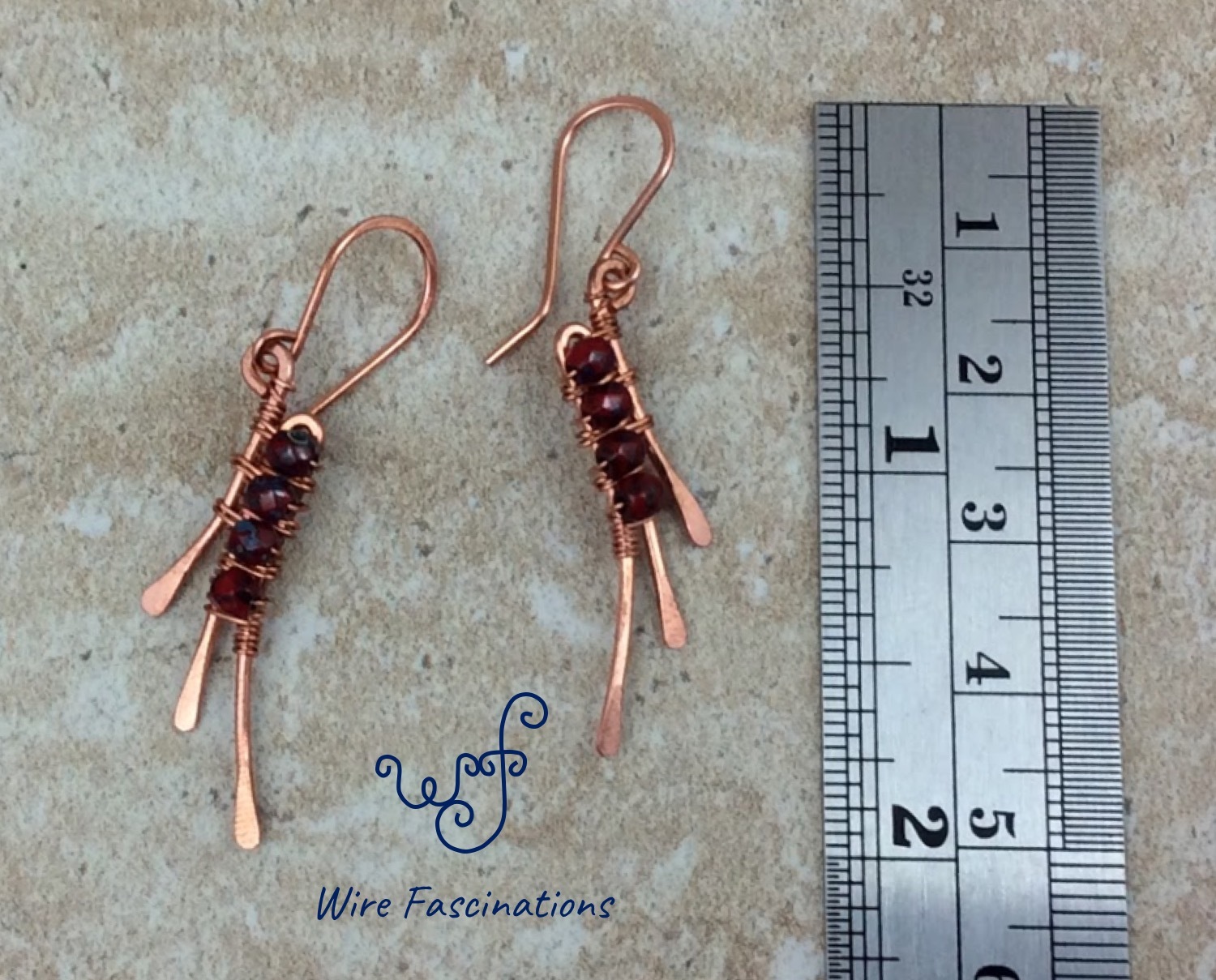Handmade copper earrings: abstract wire wrapped wings with faceted red ...