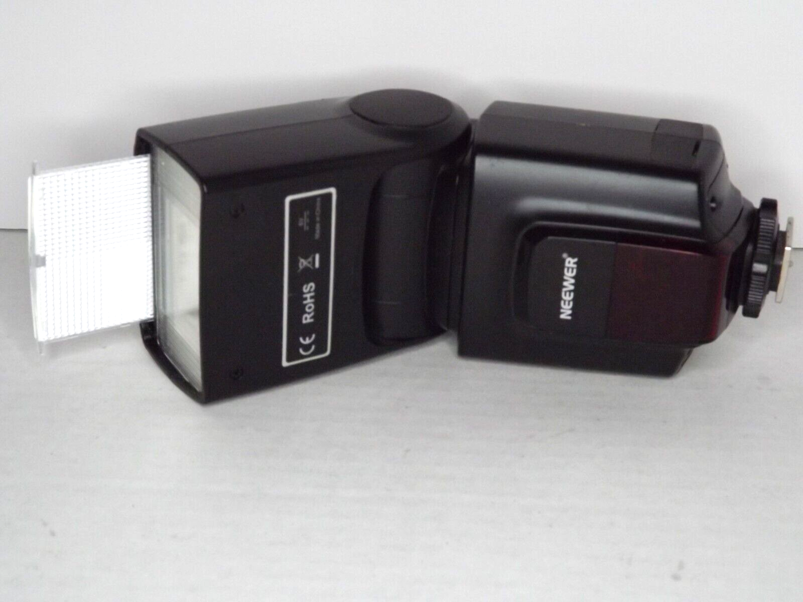 Neewer TT560 Speedlite Flash For DSLR Cameras RoHS Pre-owned (a) - Flashes